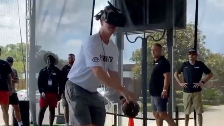 Peyton tries his hand at virtual reality football ... he's still really ...