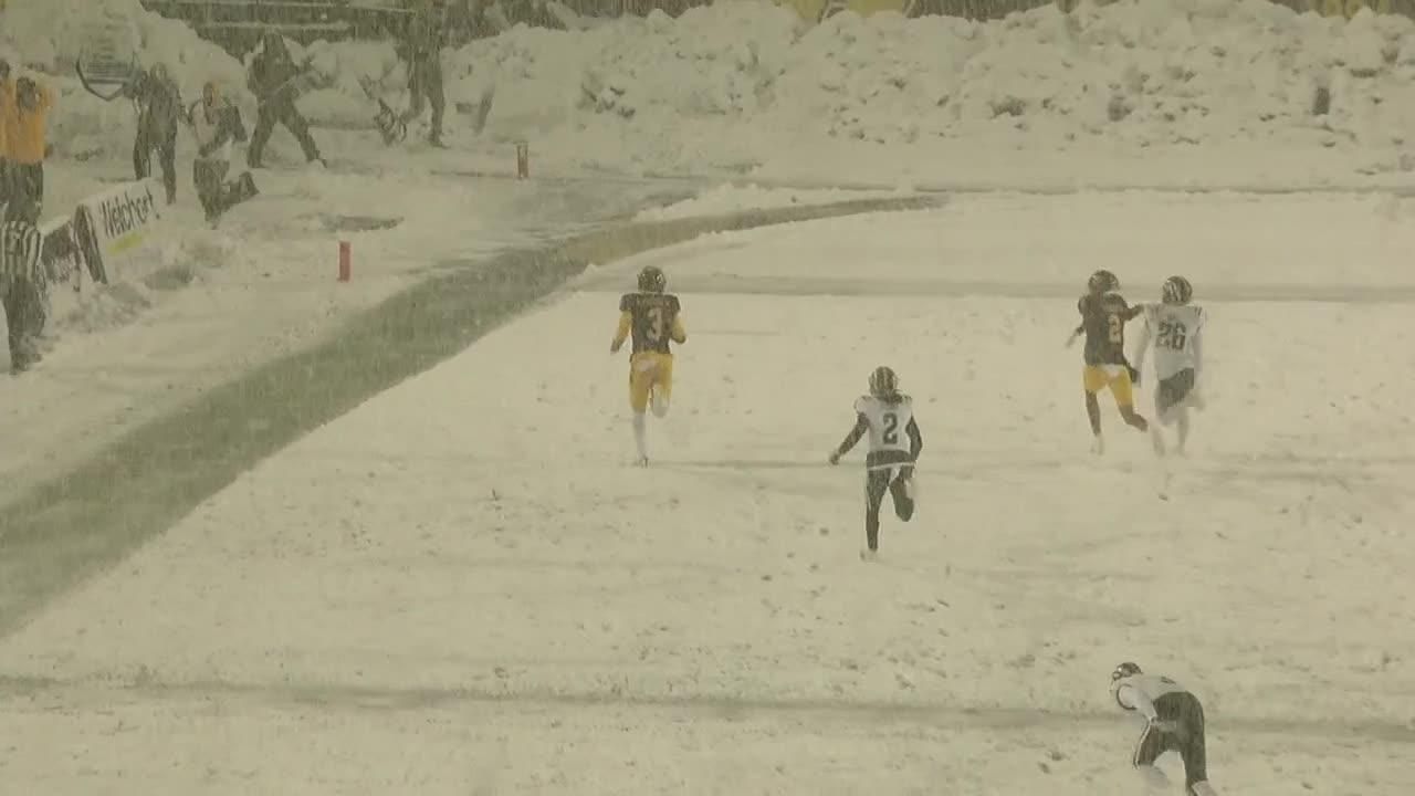 Bert Emanuel Jr. dashes through the snow for 60-yard TD - ESPN Video