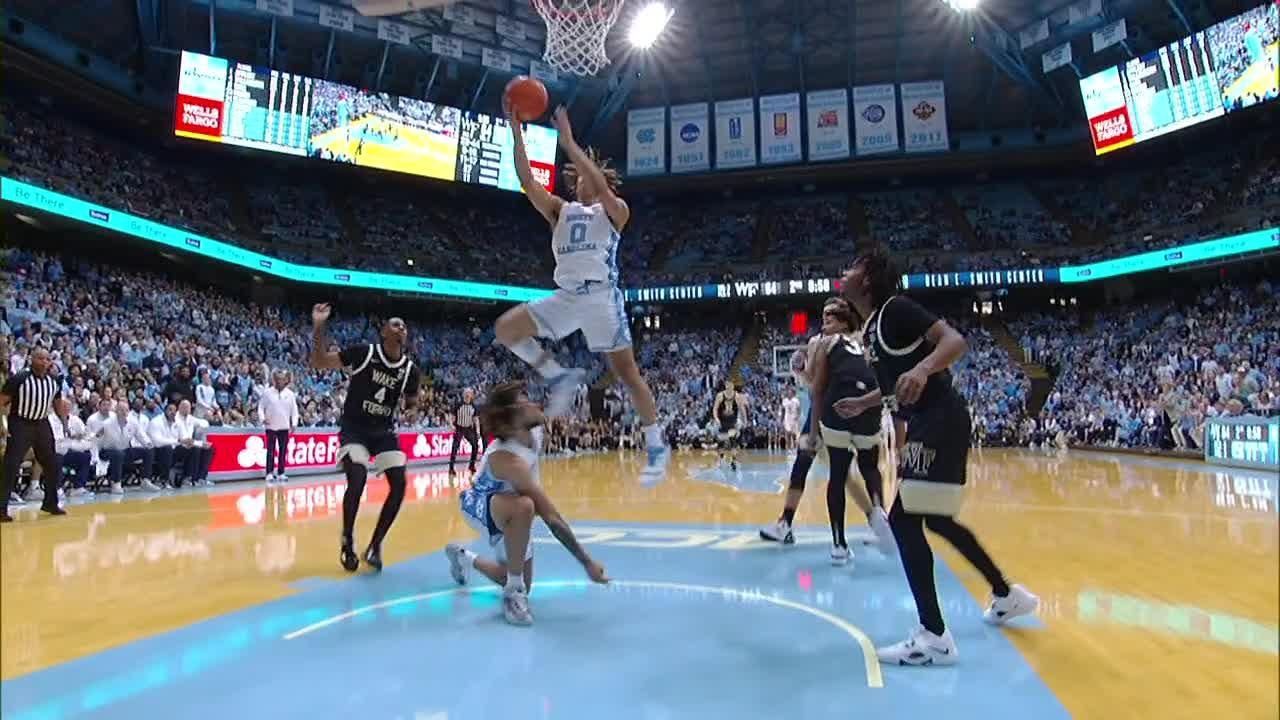 R.J. Davis makes a great pass while falling - ESPN Video