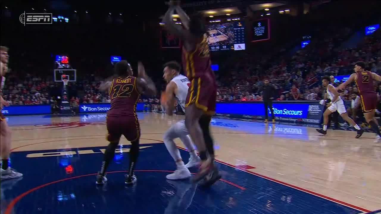 Tyler Burton makes the nice jump shot against the Loyola Chicago ...