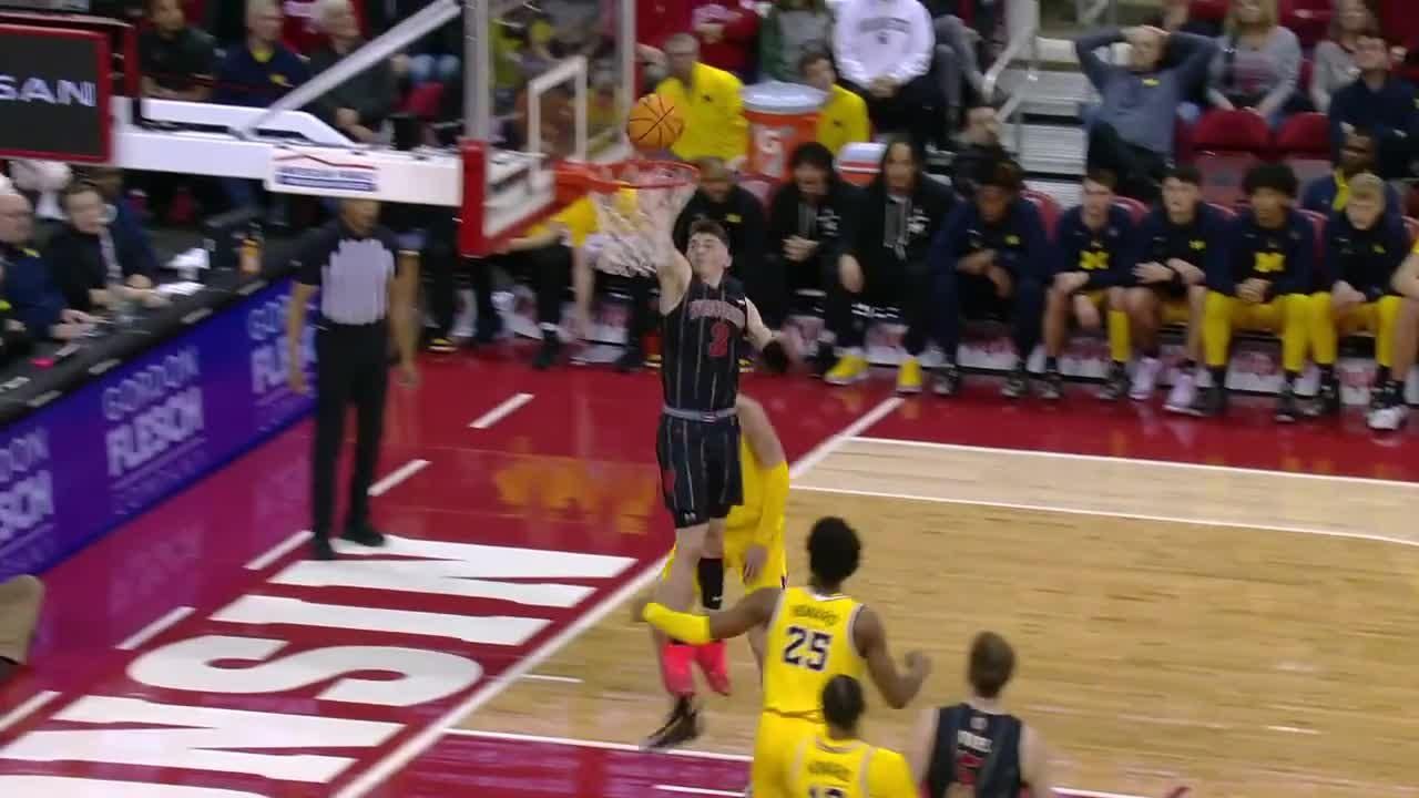 Connor Essegian gets up for the beautiful flush - ESPN Video