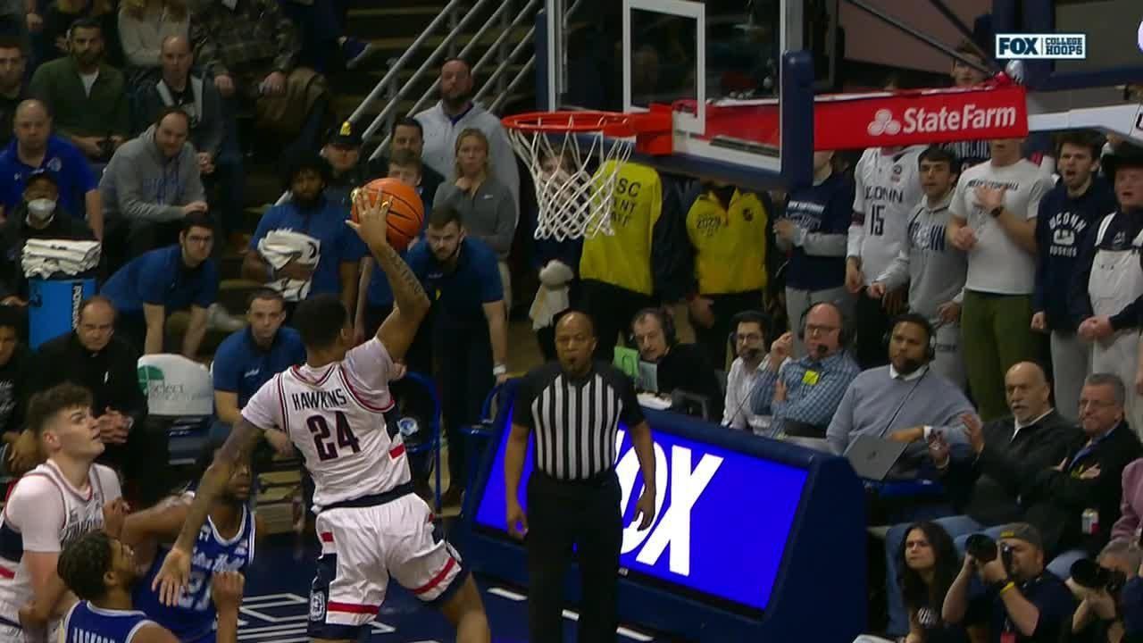 Jordan Hawkins zips through for dynamic one-handed slam - ESPN Video