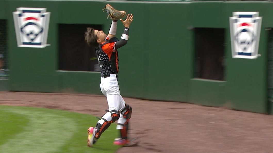 Peter Giaccio makes a nice catch behind the plate for New York - ESPN Video