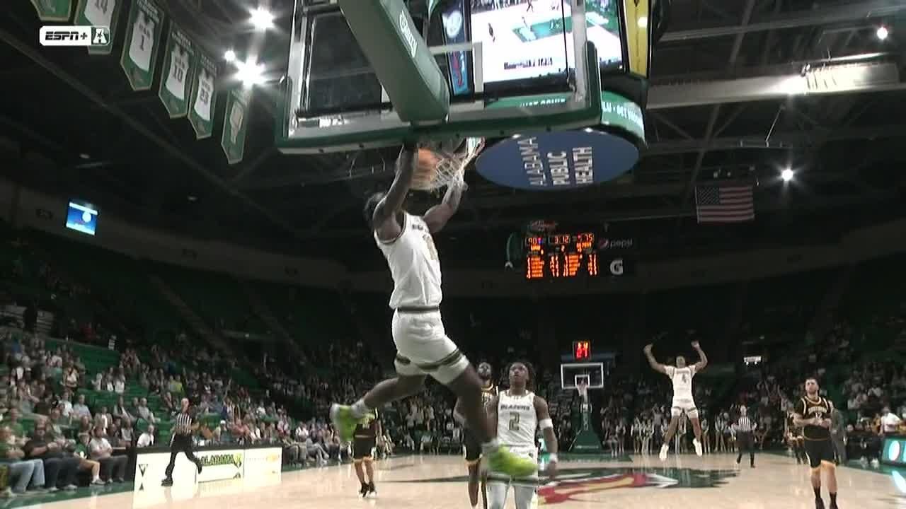 Alejandro Vasquez rocks the rim with flush - ESPN Video