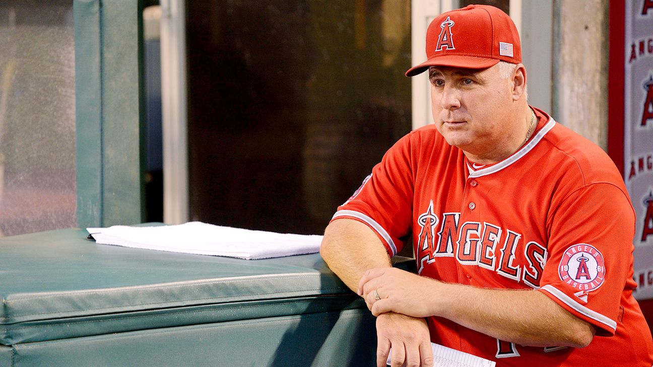 Los Angeles Angels manager Mike Scioscia, general manager Jerry Dipoto ...