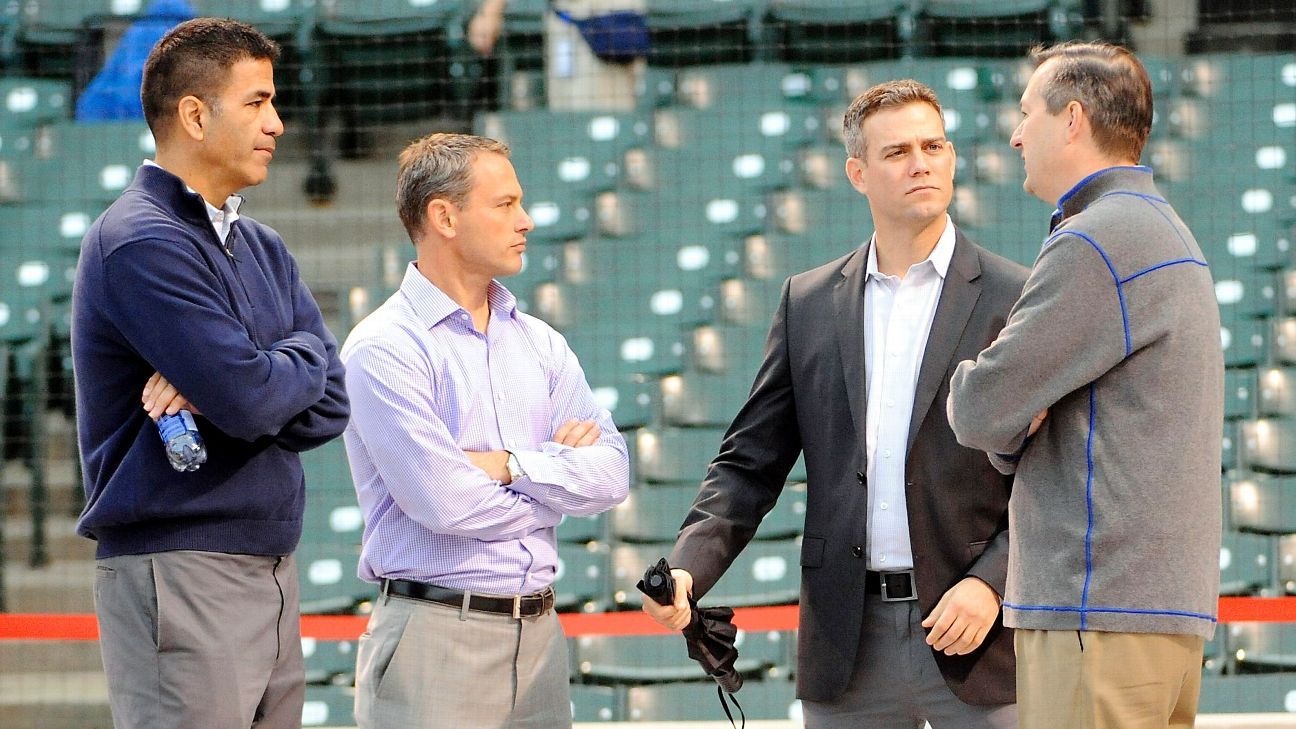 Chicago Cubs general manager Jed Hoyer, scouting director Jason McLeod ...