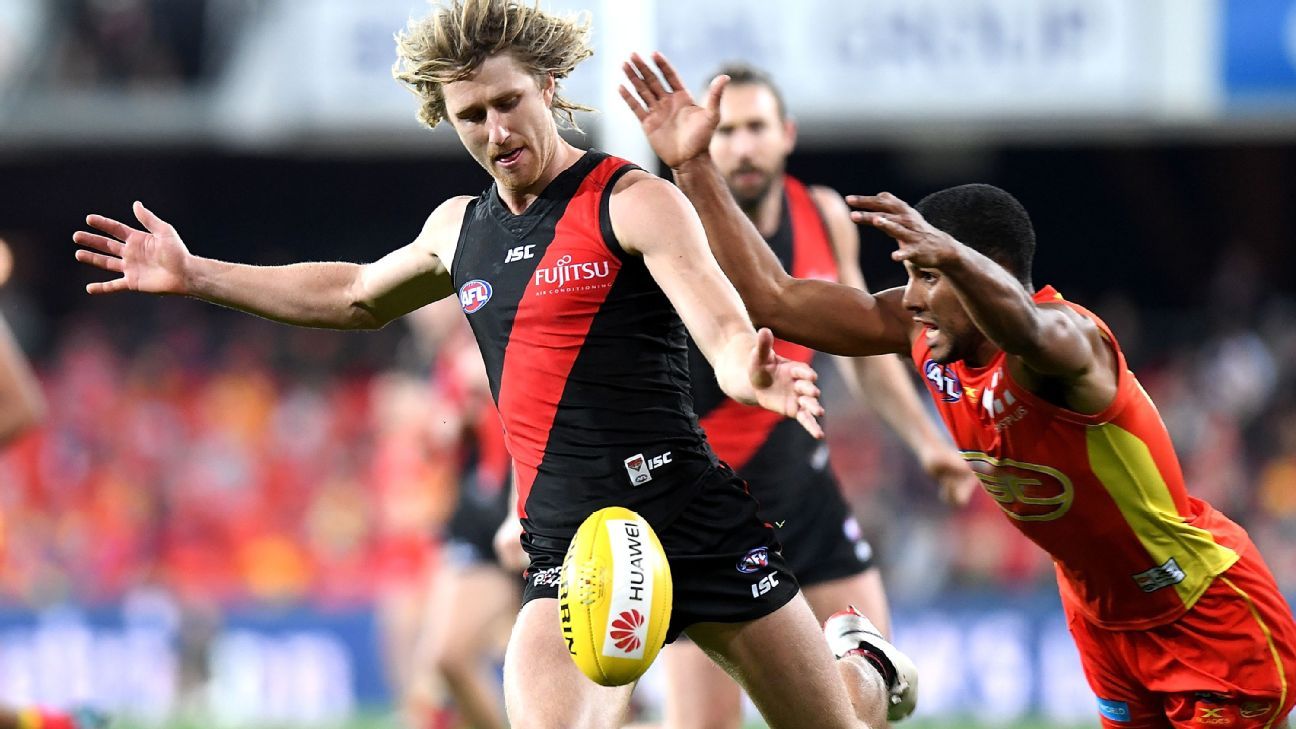 Essendon back in AFL top eight as First-gamer inspires Dons against ...