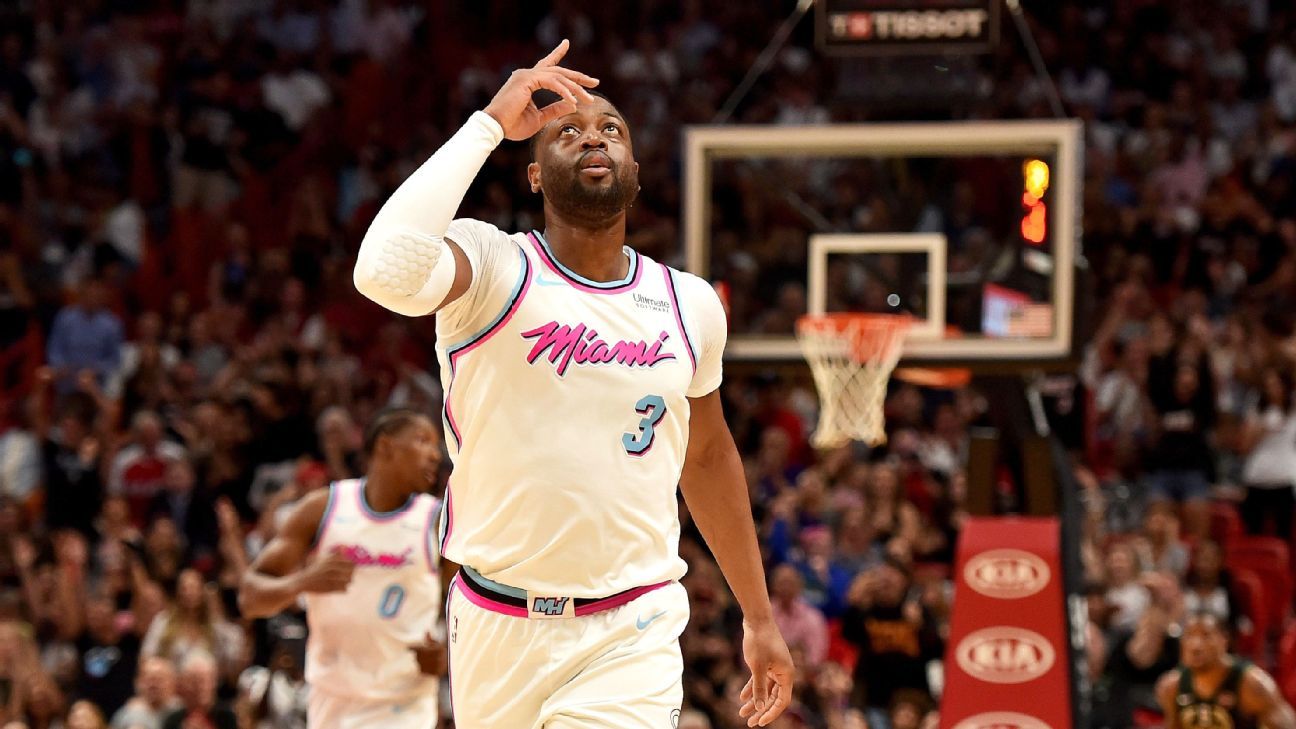 Heat wave: Dwyane Wade receives standing ovation in Miami return - ESPN