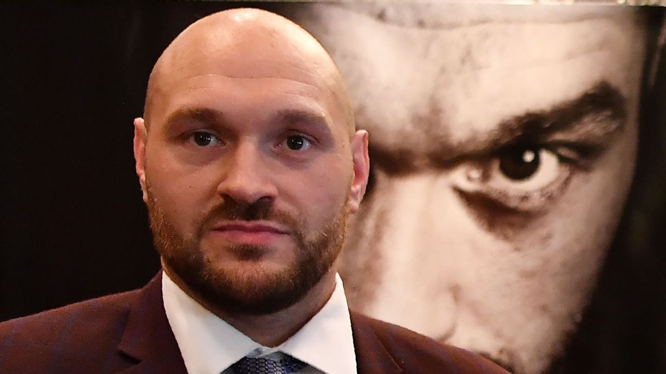 Tyson Fury back in his element as he signs with Frank Warren - ESPN
