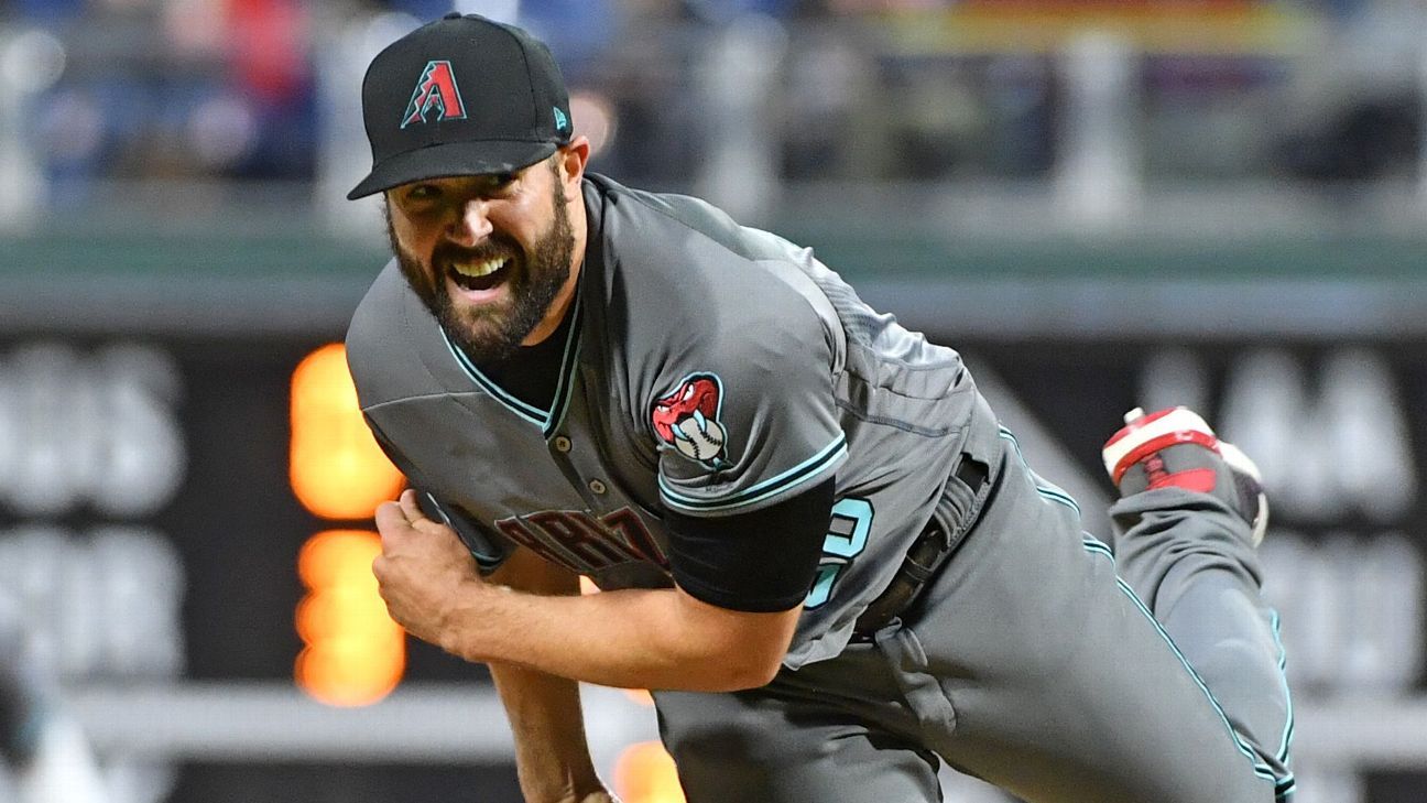 Starter Robbie Ray to have MRI after straining oblique in D-backs game ...