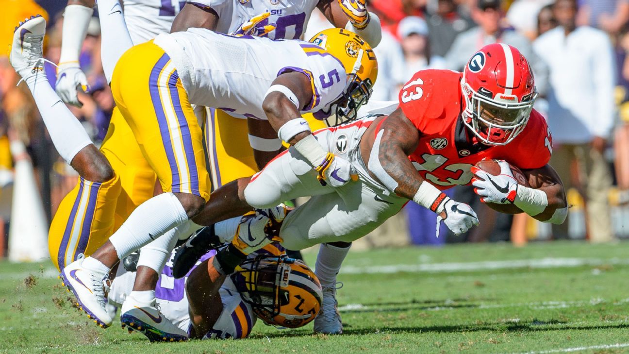 Hijo de Evander Holyfield firma con Carolina Panthers - ESPN