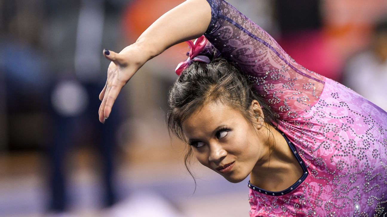Auburn gymnast walks down aisle after injuries - ESPN