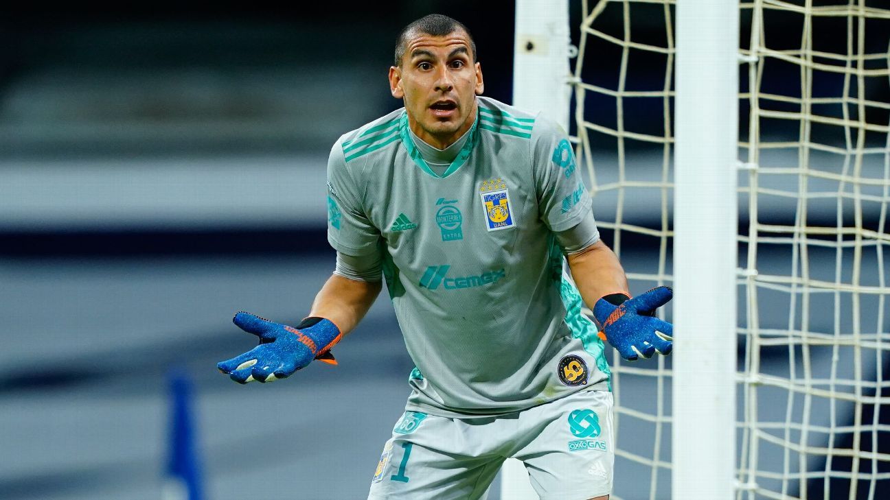 Nahuel Guzmán le responde a Ramos Rizo con una cachucha de policía - ESPN